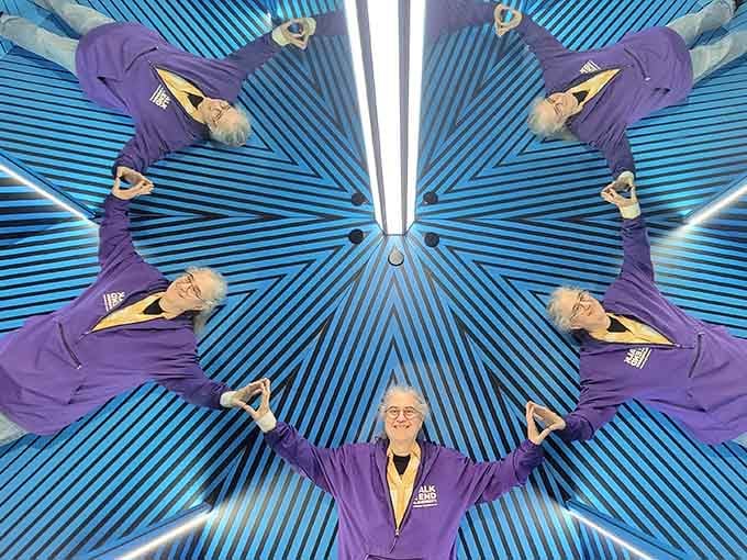 When mirrors multiply you into a geometric pattern, suddenly you're both the art and the artist.