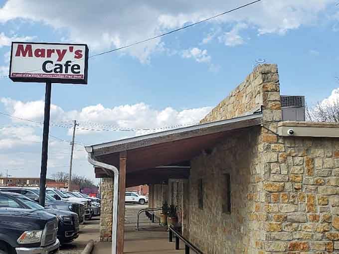 That stone exterior and packed parking lot tell you everything you need to know about what's waiting inside.