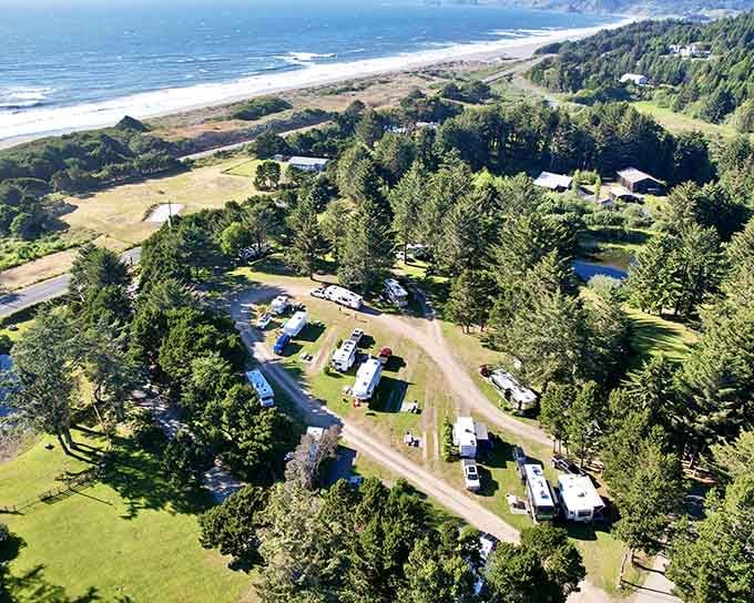 Aerial views reveal what paradise looks like when forests meet ocean and RVs find their happy place.
