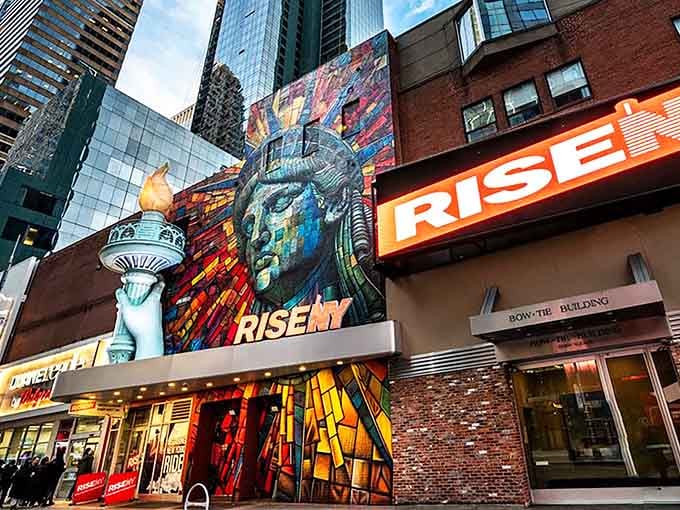 That mosaic mural of Lady Liberty isn't just street art, it's your colorful invitation to adventure in Times Square.