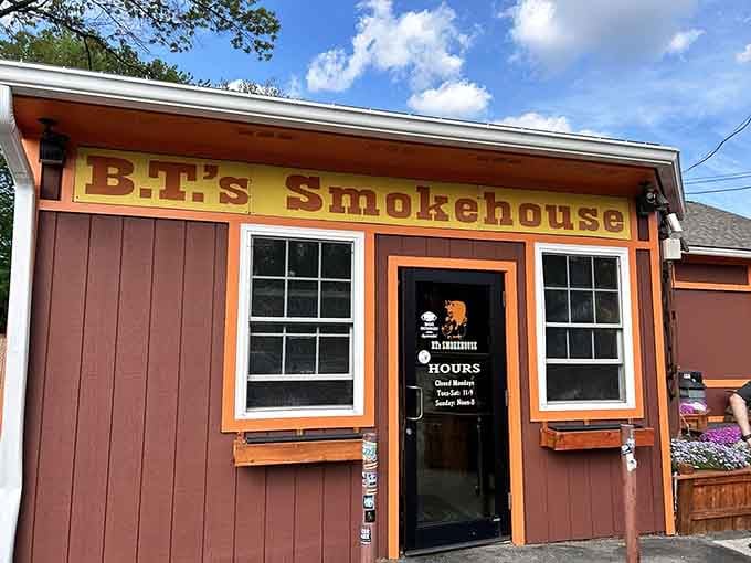 That barn-style exterior isn't just for show; it's your first hint that serious barbecue magic happens inside.