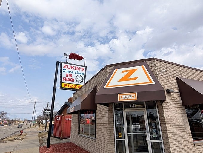 The unassuming exterior hides some of Michigan's most spectacular ribs, proving books and buildings share similar cover issues.