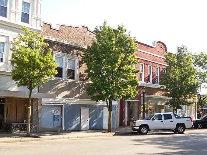 Classic storefronts line quiet streets where architecture tells stories and parking spots outnumber traffic jams by miles.