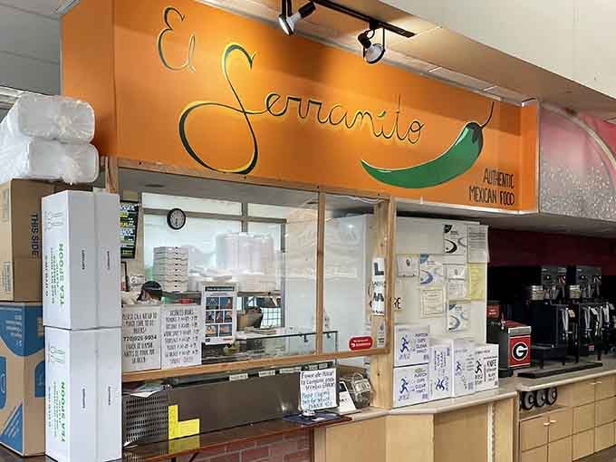 That bright orange sign isn't just decoration, it's a beacon guiding you to some of the best tacos you'll find in a gas station anywhere in Georgia.