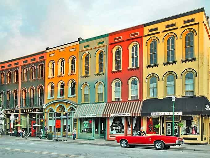 Rainbow-colored storefronts line the street like a box of crayons decided to open businesses together.