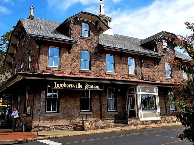 Those twin cupolas on the station roof have watched over travelers for generations, like sentinels guarding riverside memories.