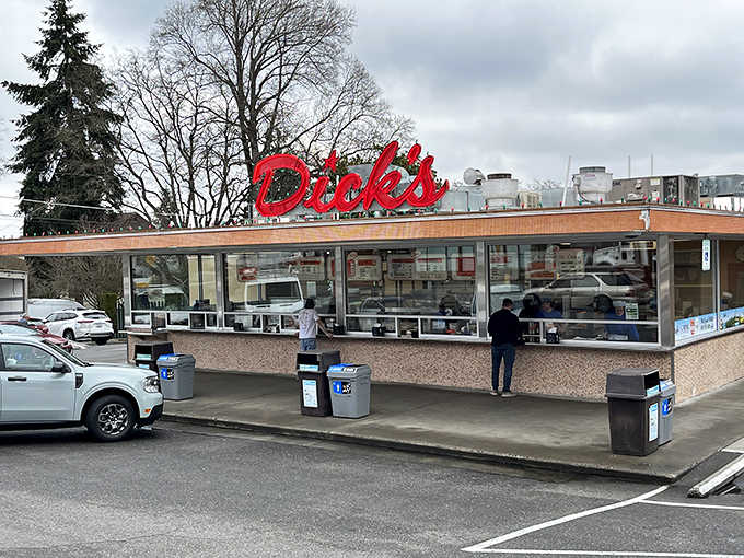 That iconic red sign isn't just signage, it's a beacon calling burger lovers home to happiness.