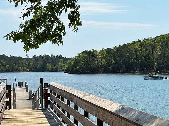That fishing pier stretches into the lake like an invitation you can't refuse, promising peaceful mornings ahead.
