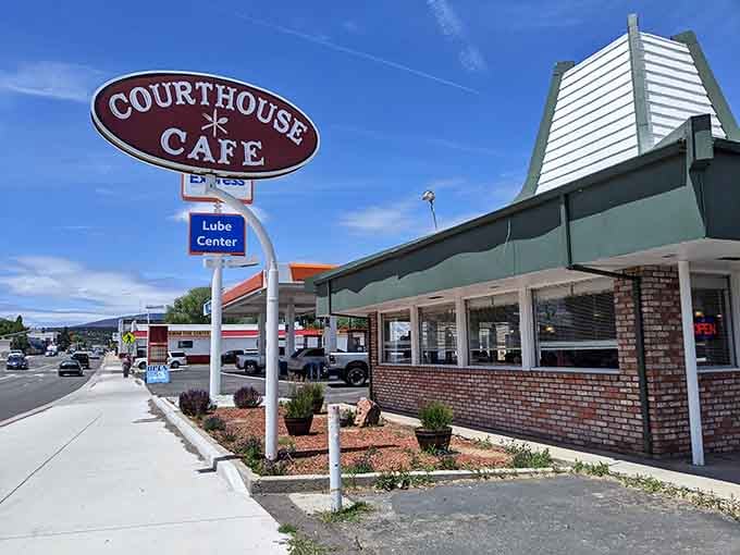 That classic oval sign and brick facade prove good diners don't need fancy architecture to draw a crowd.