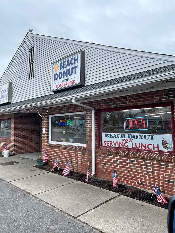 That brick exterior and simple signage promise something real &ndash; no fancy marketing needed when your donuts speak for themselves.
