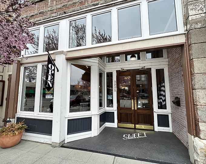 That welcoming storefront practically whispers "come inside and forget about your diet for a while."