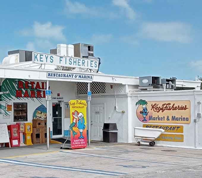That cheerful cartoon fish mascot has no idea what's about to happen inside this legendary Marathon seafood spot.