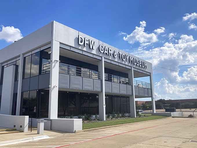 That sleek modern facade is hiding one of the most impressive automotive time capsules you'll ever encounter in Texas.