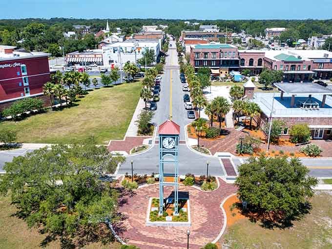 That clock tower stands guard over a main street that hasn't forgotten what community means.