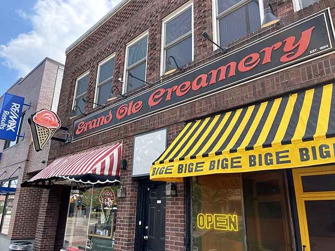 That red and white striped awning isn't just decoration, it's a beacon calling ice cream lovers home to Grand Avenue.