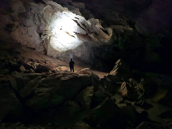 Standing in nature's own amphitheater, where silence speaks louder than any concert hall.