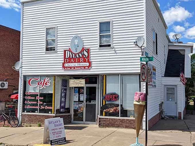 That classic small-town storefront promises homemade ice cream, cheese curds, and the kind of welcome you've been missing.