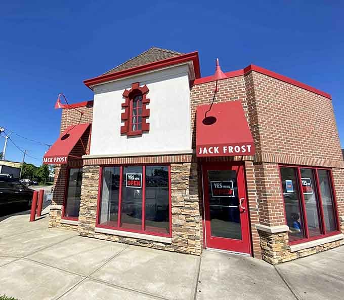 That distinctive red and white exterior isn't just charming, it's a beacon calling donut lovers home.