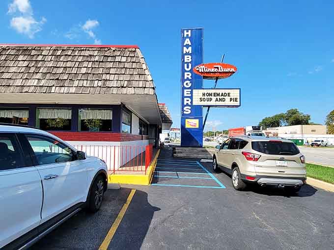 That towering blue sign isn't just advertising&mdash;it's a beacon calling you home to burger paradise in Highland.