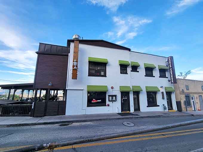 That white building with the lime green awnings is your destination, perched on Jerome's mountainside like a delicious beacon of hope.