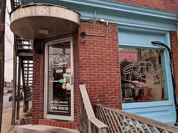 That blue trim against red brick isn't just charming, it's practically winking at you to come inside.