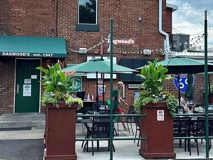 The brick facade and green awning signal you've arrived at burger paradise in Lansing, Michigan.