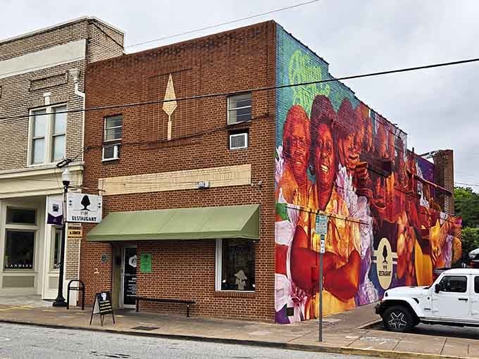 That mural isn't just street art; it's a love letter to Macon's soul food legacy painted in brilliant color.