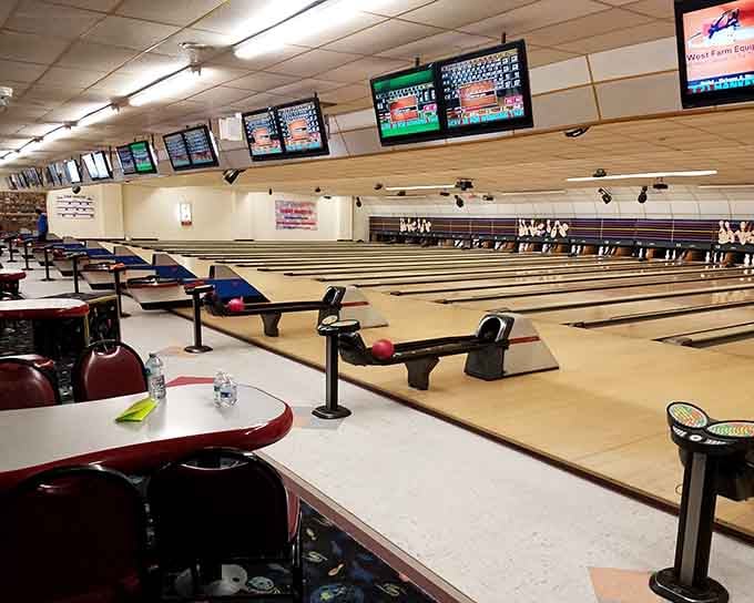 Modern scoring screens meet classic bowling charm in a space that feels both nostalgic and refreshingly current.