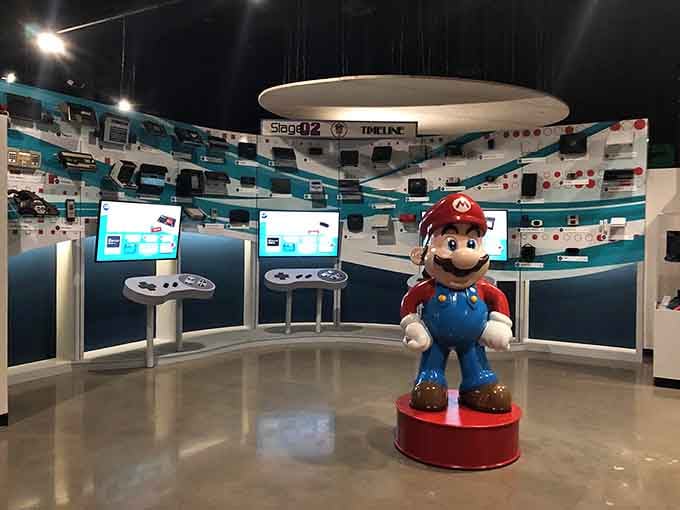 Mario stands guard over gaming history, ready to remind you that some heroes never need a graphics upgrade.