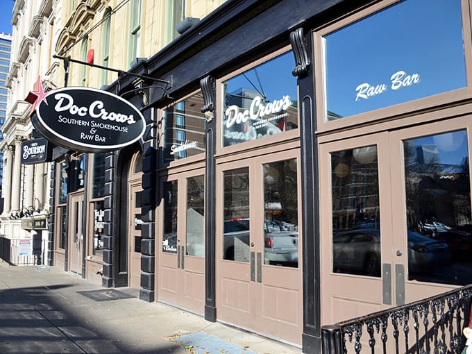 That classic oval sign hanging above the storefront is basically a beacon calling you to barbecue bliss and bourbon.