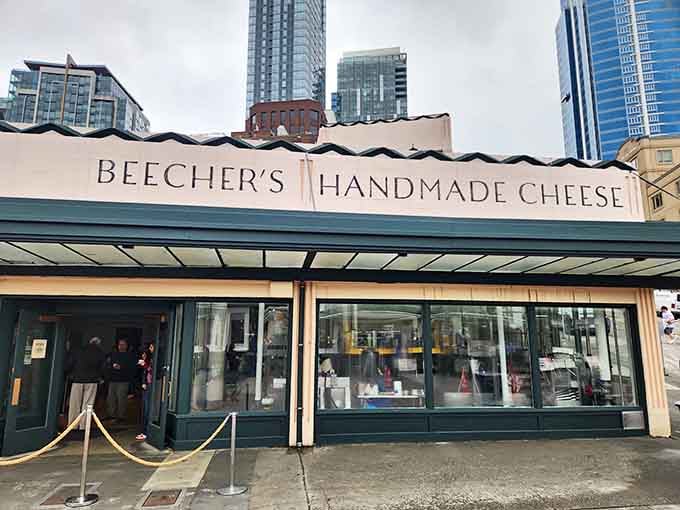 That green and cream storefront is your gateway to cheese heaven, right in Pike Place Market's beating heart.