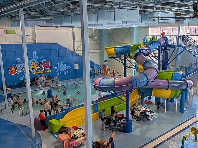 The colorful slides twist overhead like a Dr. Seuss fever dream, proving upstate New York has serious tropical ambitions.