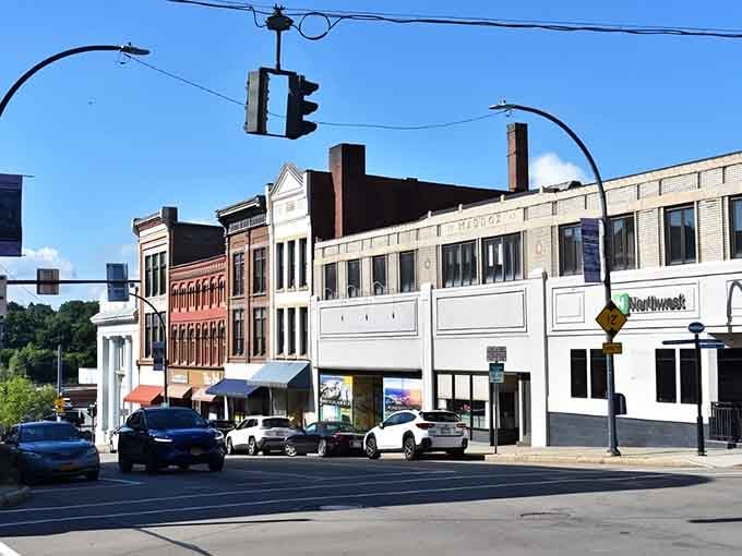 These storefronts have witnessed more history than most history books, and they're still standing proud under blue skies.