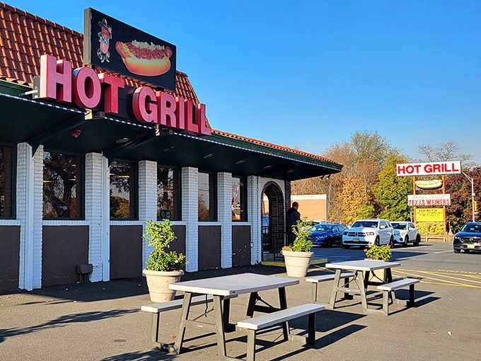 That orange-tiled roof isn't just architecture&mdash;it's a beacon guiding hungry souls to hot dog salvation for six decades.