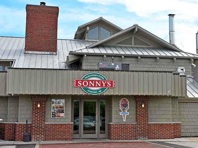 That cheerful exterior is your first hint that serious Italian cooking and stunning water views are waiting just inside those doors.