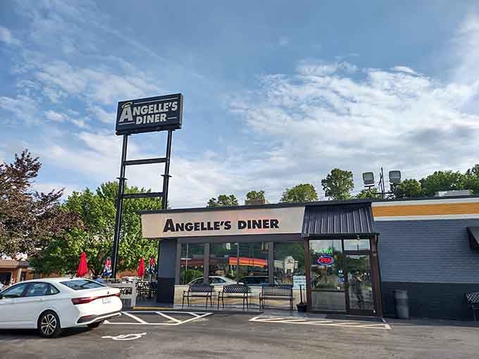 That sign standing tall against the Virginia sky isn't just pointing you toward food, it's pointing you toward happiness in diner form.