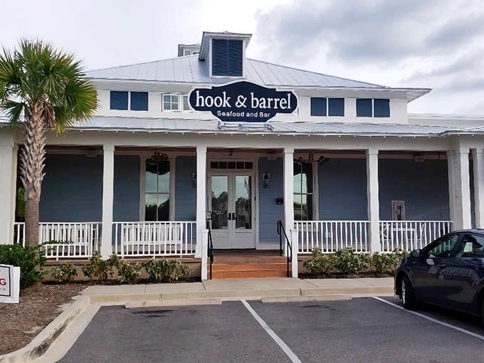 Hook & Barrel's charming coastal exterior promises the kind of seafood feast that'll have you planning your return visit before you've even left.