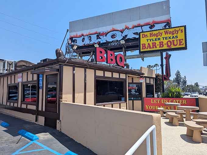 That sign isn't whispering—it's announcing barbecue loud enough to make your stomach rumble from blocks away.
