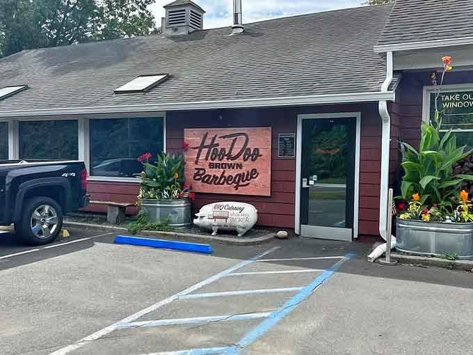 That red barn exterior isn't fooling anyone – the smoke signals give away Connecticut's best-kept barbecue secret.