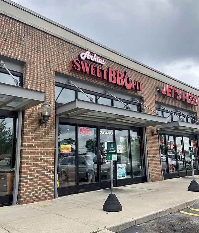 That bold red signage beckons like a lighthouse for barbecue lovers, guiding you to smoky salvation in Southfield.