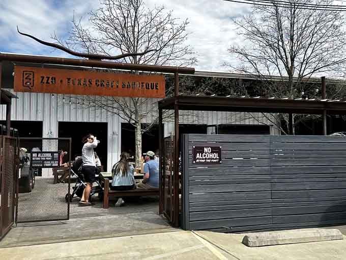 That entrance isn't just a gateway; it's a portal to smoky, meaty paradise in Scott's Addition.