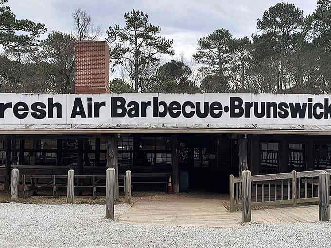 That brick chimney isn't just for show, it's been billowing hickory smoke since Hoover was president.