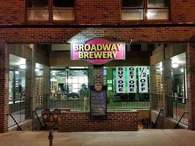 That colorful sign beckons like a lighthouse for hungry souls seeking craft beer and comfort food.
