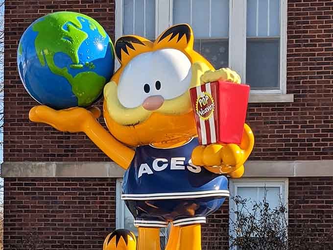 Sporting an Aces jersey and holding the world, this statue captures Garfield's rare moment of athletic enthusiasm.