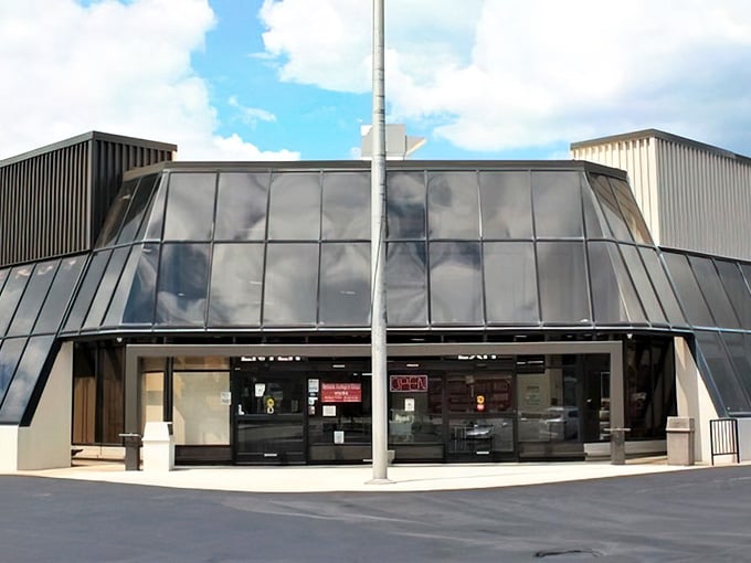 The architectural angles and sweeping windows hint at the sprawling wonderland of vintage finds that await beyond those doors.