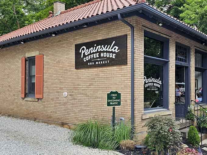 That red tile roof and brick facade practically whisper "come inside, we've got the good stuff waiting."