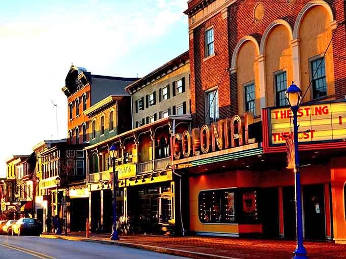Historic downtown charm meets neon-lit nostalgia&mdash;where classic American architecture and vintage marquees create pure Main Street magic.