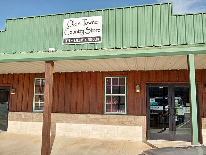 That mint-green metal roof and rustic wood siding signal you've arrived at small-town bakery heaven.