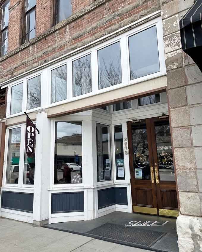 That classic storefront with the "OPEN" sign is basically sending you a personal invitation to carb heaven.