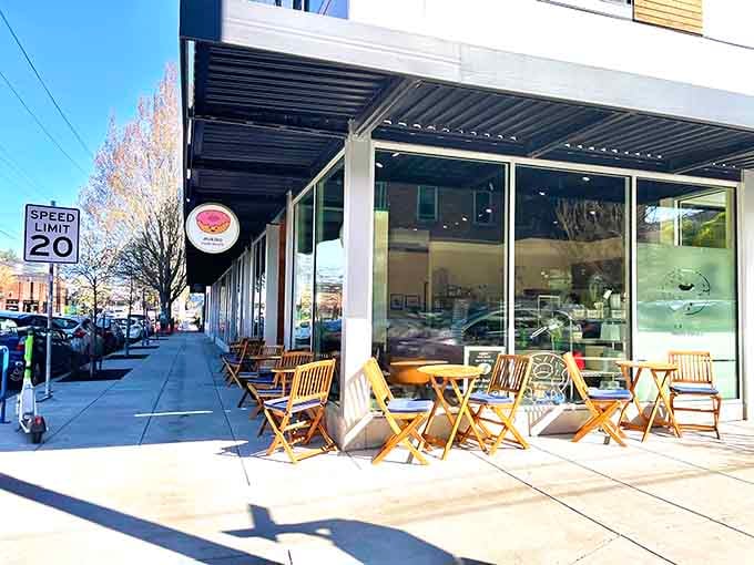 That cheerful pink donut logo beckons from the storefront like a delicious siren song you actually want to answer.